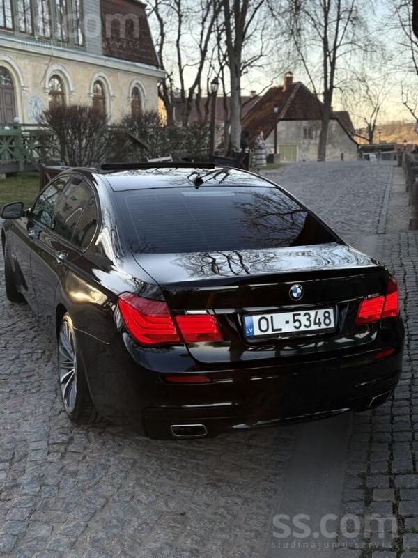 Black BMW 740 2011 in Kuldiga, with an engine capacity of 3.00 L and mileage of 0 thousand km for 9990 €, photo 1 on AUTOMOTO.COM.LV