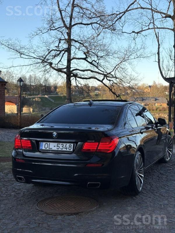 Black BMW 740 2011 in Kuldiga, with an engine capacity of 3.00 L and mileage of 0 thousand km for 9990 €, photo 6 on AUTOMOTO.COM.LV