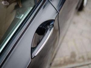 Black BMW 740 2011 in Marijampole, with an engine capacity of 3.00 L and mileage of 219 thousand km for 13950 €, photo 14 on AUTOMOTO.COM.LV