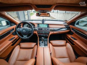 Black BMW 740 2011 in Marijampole, with an engine capacity of 3.00 L and mileage of 219 thousand km for 13950 €, photo 16 on AUTOMOTO.COM.LV