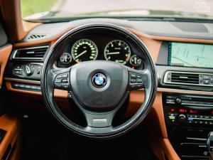 Black BMW 740 2011 in Marijampole, with an engine capacity of 3.00 L and mileage of 219 thousand km for 13950 €, photo 17 on AUTOMOTO.COM.LV