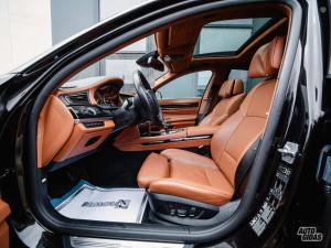 Black BMW 740 2011 in Marijampole, with an engine capacity of 3.00 L and mileage of 219 thousand km for 13950 €, photo 22 on AUTOMOTO.COM.LV