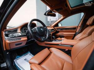 Black BMW 740 2011 in Marijampole, with an engine capacity of 3.00 L and mileage of 219 thousand km for 13950 €, photo 24 on AUTOMOTO.COM.LV