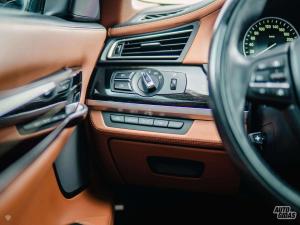 Black BMW 740 2011 in Marijampole, with an engine capacity of 3.00 L and mileage of 219 thousand km for 13950 €, photo 28 on AUTOMOTO.COM.LV