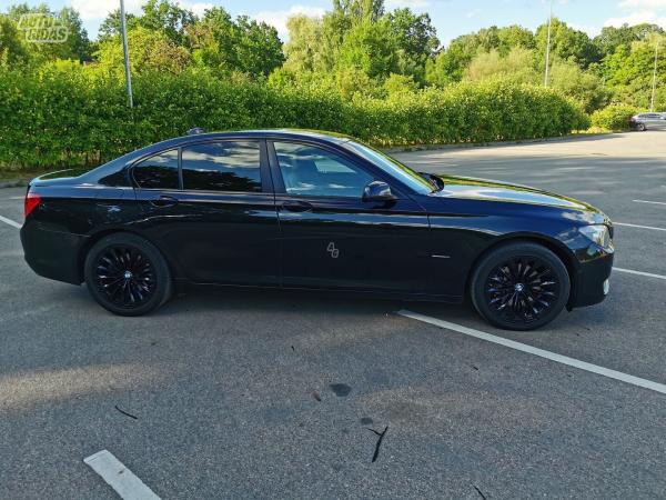 Black BMW 740 2011 in Vilnius, with an engine capacity of 3.00 L and mileage of 426 thousand km for 9900 €, photo 6 on AUTOMOTO.COM.LV