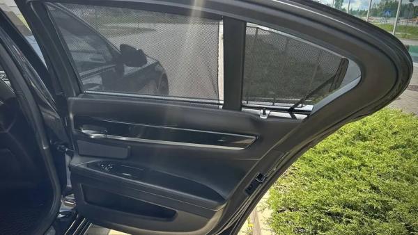 Black BMW 740 2011 in Rezekne, with an engine capacity of 3.00 L and mileage of 361 thousand km for 9990 €, photo 8 on AUTOMOTO.COM.LV