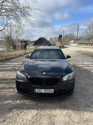 Black BMW 740 2011 in Talsi, with an engine capacity of 3.00 L and mileage of 268 thousand km for 14000 €, photo 7 on AUTOMOTO.COM.LV