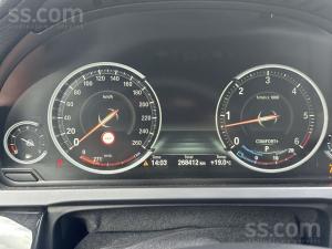 Black BMW 740 2011 in Talsi, with an engine capacity of 3.00 L and mileage of 268 thousand km for 14000 €, photo 11 on AUTOMOTO.COM.LV