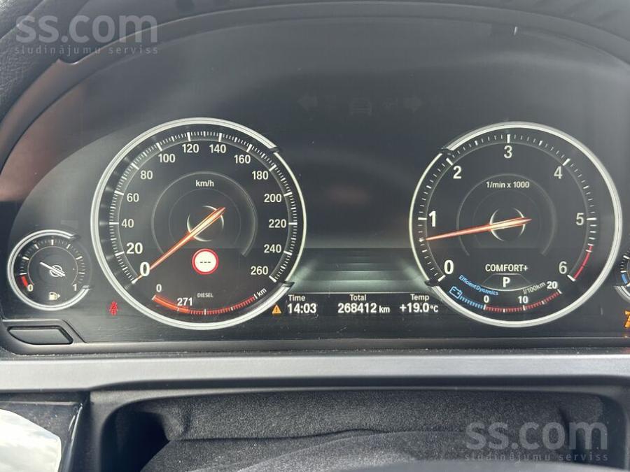 Black BMW 740 2011 in Talsi, with an engine capacity of 3.00 L and mileage of 268 thousand km for 14000 €, photo 11 on AUTOMOTO.COM.LV