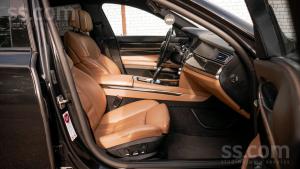 Black BMW 740 2011 in Daugavpils, with an engine capacity of 3.00 L and mileage of 250 thousand km for 12200 €, photo 9 on AUTOMOTO.COM.LV