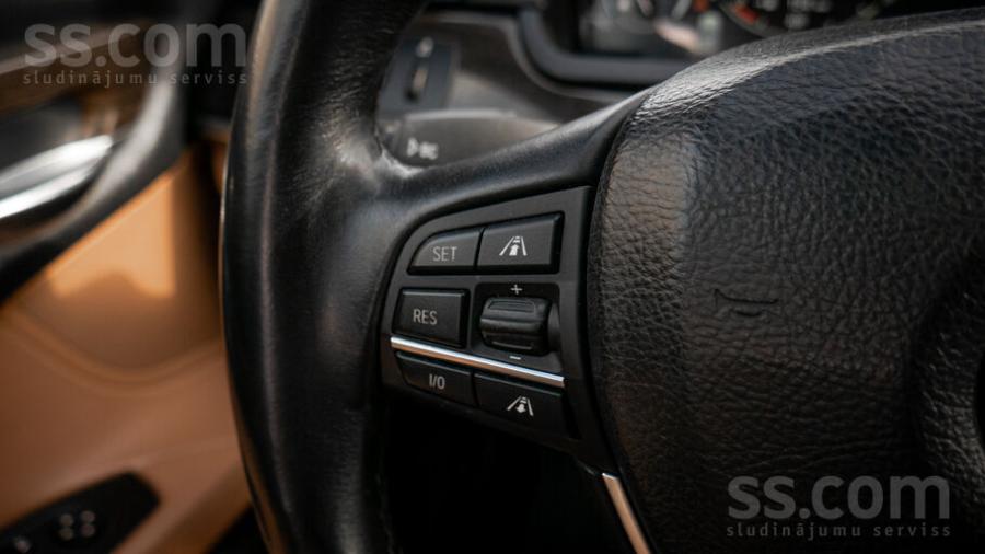 Black BMW 740 2011 in Daugavpils, with an engine capacity of 3.00 L and mileage of 250 thousand km for 12200 €, photo 15 on AUTOMOTO.COM.LV