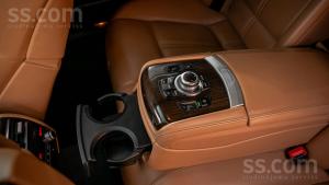 Black BMW 740 2011 in Daugavpils, with an engine capacity of 3.00 L and mileage of 250 thousand km for 12200 €, photo 16 on AUTOMOTO.COM.LV