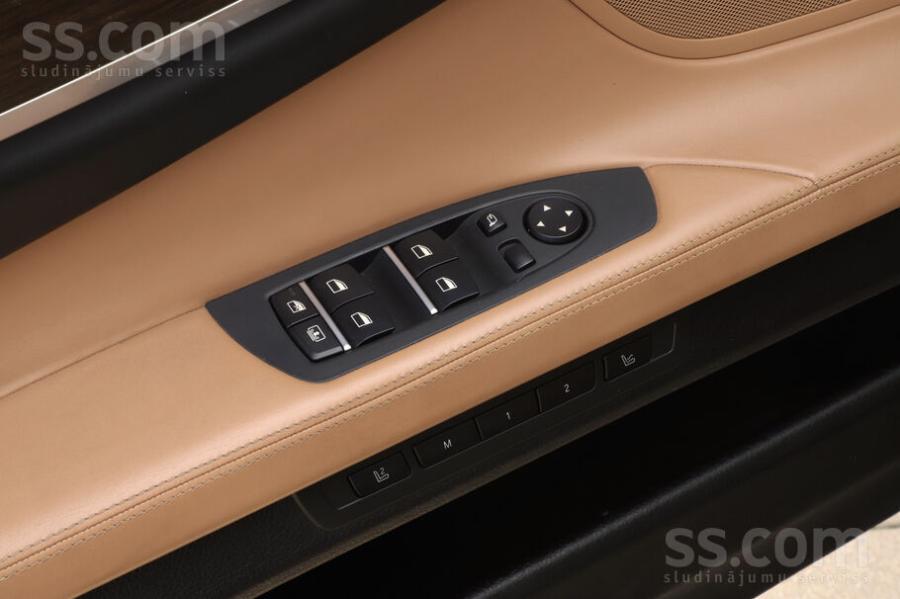 Black BMW 740 2011 in Tukums, with an engine capacity of 3.00 L and mileage of 0 thousand km for 7500 €, photo 11 on AUTOMOTO.COM.LV