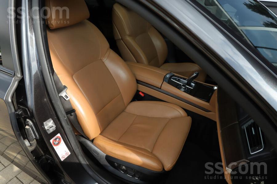 Black BMW 740 2011 in Tukums, with an engine capacity of 3.00 L and mileage of 0 thousand km for 7500 €, photo 17 on AUTOMOTO.COM.LV