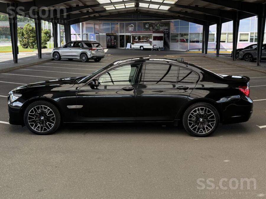 Melns BMW 740 2011 Rīga, ar dzinēja tilpumu 3.00 L un nobraukumu 281 tūkst. km par 14000 €, foto 5 vietnē AUTOMOTO.COM.LV