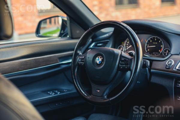 Black BMW 740 2012 in Jurmala, with an engine capacity of 3.00 L and mileage of 260 thousand km for 14300 €, photo 7 on AUTOMOTO.COM.LV