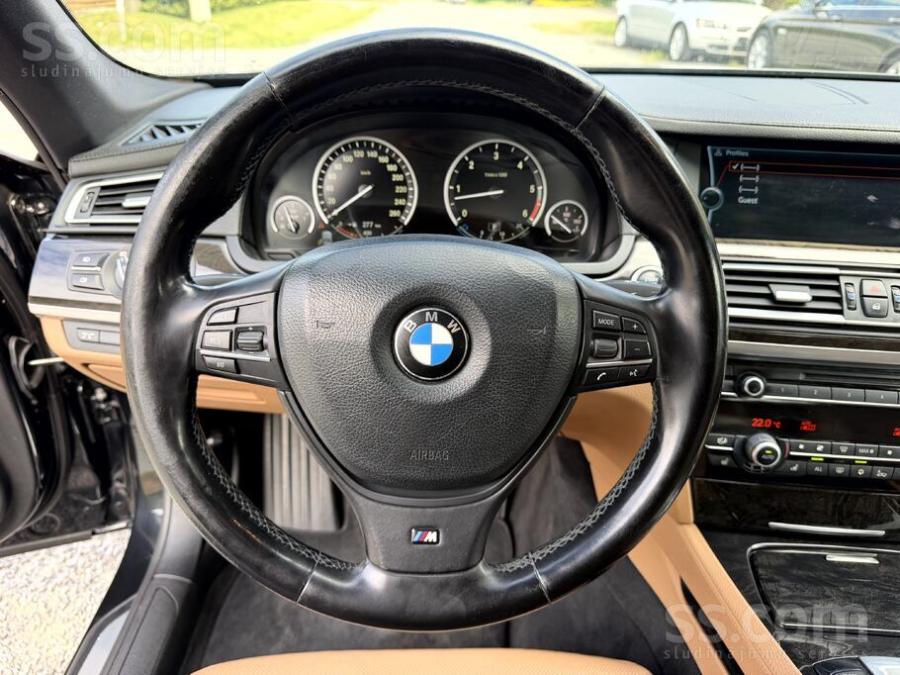 Black BMW 740 2012 in Saldus, with an engine capacity of 3.00 L and mileage of 262 thousand km for 11950 €, photo 23 on AUTOMOTO.COM.LV