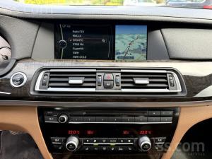 Black BMW 740 2012 in Saldus, with an engine capacity of 3.00 L and mileage of 262 thousand km for 11950 €, photo 25 on AUTOMOTO.COM.LV