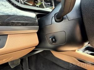 Black BMW 740 2012 in Saldus, with an engine capacity of 3.00 L and mileage of 262 thousand km for 11950 €, photo 30 on AUTOMOTO.COM.LV