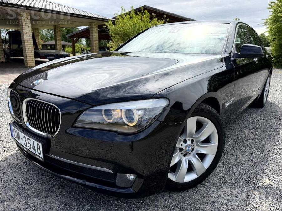 Black BMW 740 2012 in Saldus, with an engine capacity of 3.00 L and mileage of 262 thousand km for 11950 €, photo 33 on AUTOMOTO.COM.LV