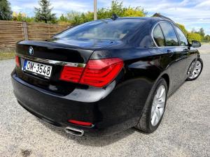 Black BMW 740 2012 in Saldus, with an engine capacity of 3.00 L and mileage of 262 thousand km for 11950 €, photo 34 on AUTOMOTO.COM.LV