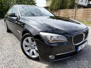 Black BMW 740 2012 in Saldus, with an engine capacity of 3.00 L and mileage of 262 thousand km for 11950 €, photo 35 on AUTOMOTO.COM.LV