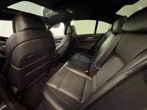 Black BMW 740 2012 in Marijampole, with an engine capacity of 2.99 L and mileage of 222 thousand km for 12450 €, photo 9 on AUTOMOTO.COM.LV