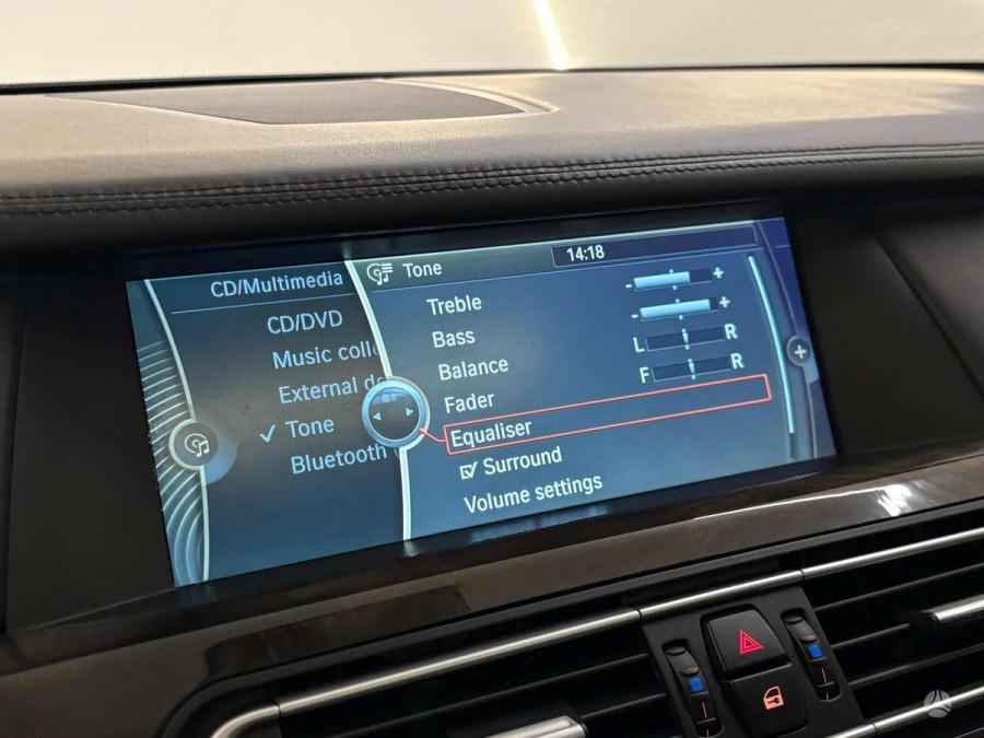 Black BMW 740 2012 in Marijampole, with an engine capacity of 2.99 L and mileage of 222 thousand km for 12450 €, photo 14 on AUTOMOTO.COM.LV