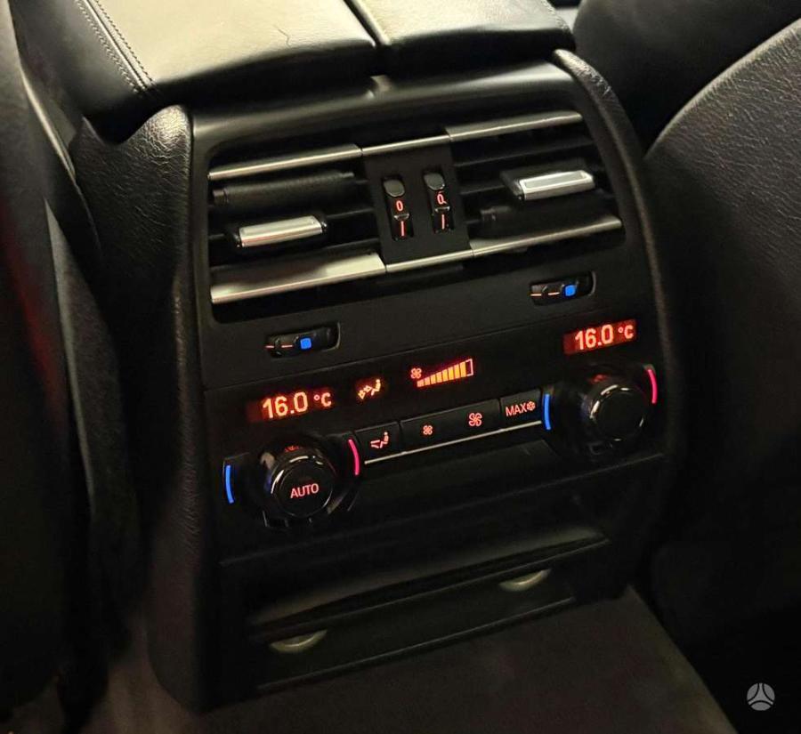 Black BMW 740 2012 in Marijampole, with an engine capacity of 2.99 L and mileage of 222 thousand km for 12450 €, photo 19 on AUTOMOTO.COM.LV