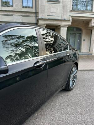 Black BMW 740 2012 in Jurmala, with an engine capacity of 3.00 L and mileage of 188 thousand km for 14300 €, photo 8 on AUTOMOTO.COM.LV