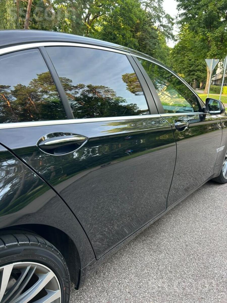 Black BMW 740 2012 in Jurmala, with an engine capacity of 3.00 L and mileage of 188 thousand km for 14300 €, photo 12 on AUTOMOTO.COM.LV