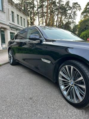 Black BMW 740 2012 in Jurmala, with an engine capacity of 3.00 L and mileage of 188 thousand km for 14300 €, photo 13 on AUTOMOTO.COM.LV