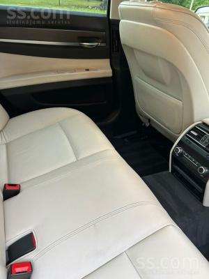 Black BMW 740 2012 in Jurmala, with an engine capacity of 3.00 L and mileage of 188 thousand km for 14300 €, photo 20 on AUTOMOTO.COM.LV