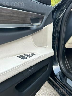 Black BMW 740 2012 in Jurmala, with an engine capacity of 3.00 L and mileage of 188 thousand km for 14300 €, photo 25 on AUTOMOTO.COM.LV