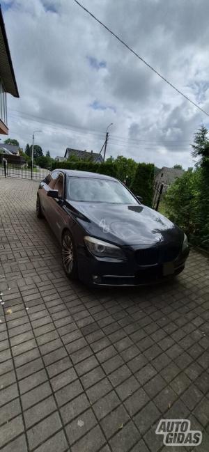 Black BMW 740 2012 in Siauliai, with an engine capacity of 3.00 L and mileage of 300 thousand km for 9500 €, photo  on AUTOMOTO.COM.LV