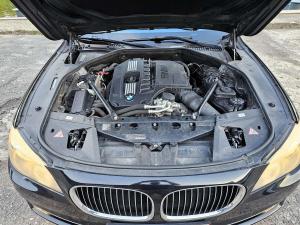 Black BMW 740 2012 in Klaipeda, with an engine capacity of 2.98 L and mileage of 250 thousand km for 7999 €, photo 24 on AUTOMOTO.COM.LV