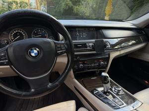 Black BMW 740 2012 in Jurmala, with an engine capacity of 3.00 L and mileage of 304 thousand km for 12000 €, photo 12 on AUTOMOTO.COM.LV