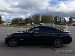 Black BMW 740 2012 in Riga, with an engine capacity of 3.00 L and mileage of 0 thousand km for 9990 €, photo 6 on AUTOMOTO.COM.LV