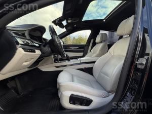 Black BMW 740 2012 in Riga, with an engine capacity of 3.00 L and mileage of 0 thousand km for 9990 €, photo 10 on AUTOMOTO.COM.LV