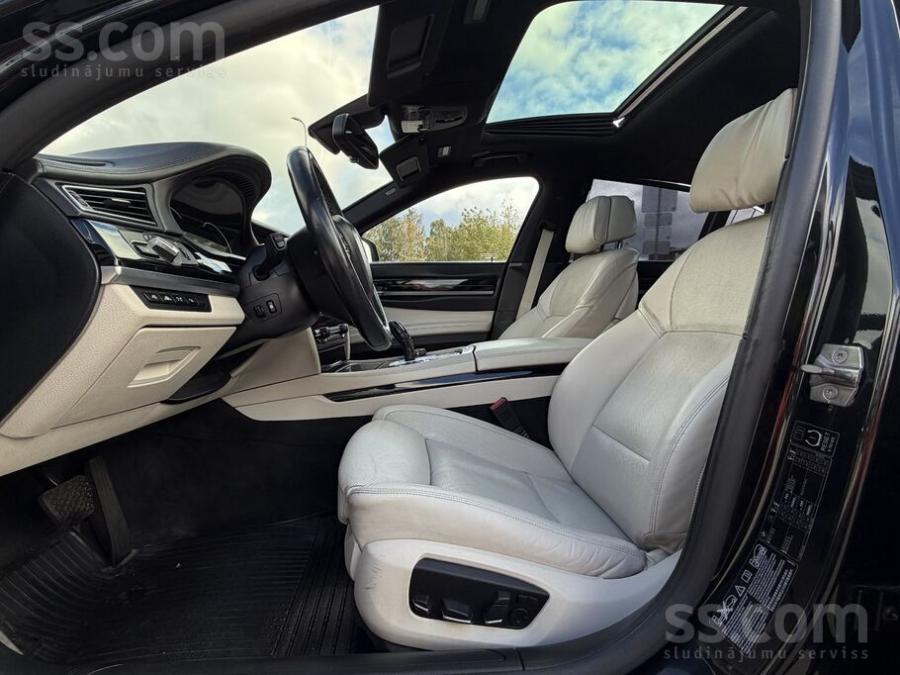 Black BMW 740 2012 in Riga, with an engine capacity of 3.00 L and mileage of 0 thousand km for 9990 €, photo 10 on AUTOMOTO.COM.LV