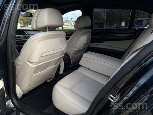 Black BMW 740 2012 in Riga, with an engine capacity of 3.00 L and mileage of 0 thousand km for 9990 €, photo 12 on AUTOMOTO.COM.LV
