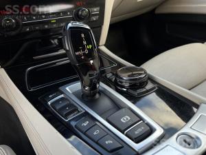 Black BMW 740 2012 in Riga, with an engine capacity of 3.00 L and mileage of 0 thousand km for 9990 €, photo 13 on AUTOMOTO.COM.LV