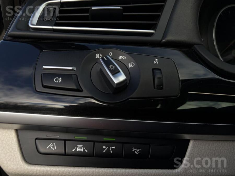 Black BMW 740 2012 in Riga, with an engine capacity of 3.00 L and mileage of 0 thousand km for 9990 €, photo 14 on AUTOMOTO.COM.LV
