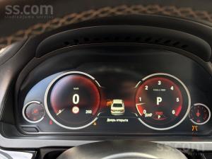 Black BMW 740 2012 in Riga, with an engine capacity of 3.00 L and mileage of 0 thousand km for 9990 €, photo 16 on AUTOMOTO.COM.LV