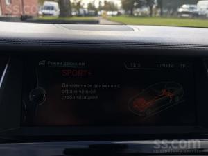 Black BMW 740 2012 in Riga, with an engine capacity of 3.00 L and mileage of 0 thousand km for 9990 €, photo 18 on AUTOMOTO.COM.LV