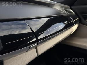 Black BMW 740 2012 in Riga, with an engine capacity of 3.00 L and mileage of 0 thousand km for 9990 €, photo 23 on AUTOMOTO.COM.LV