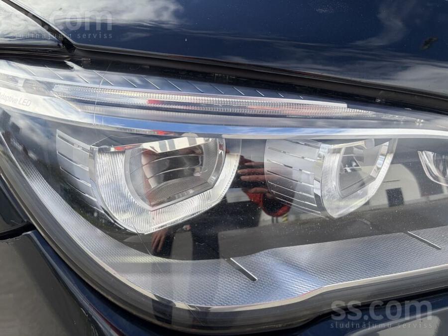 Black BMW 740 2012 in Riga, with an engine capacity of 3.00 L and mileage of 0 thousand km for 9990 €, photo 28 on AUTOMOTO.COM.LV