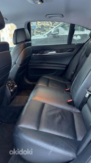 Black BMW 740 2013 in Tallinn, with an engine capacity of 3.00 L and mileage of 188 thousand km for 14000 €, photo 11 on AUTOMOTO.COM.LV