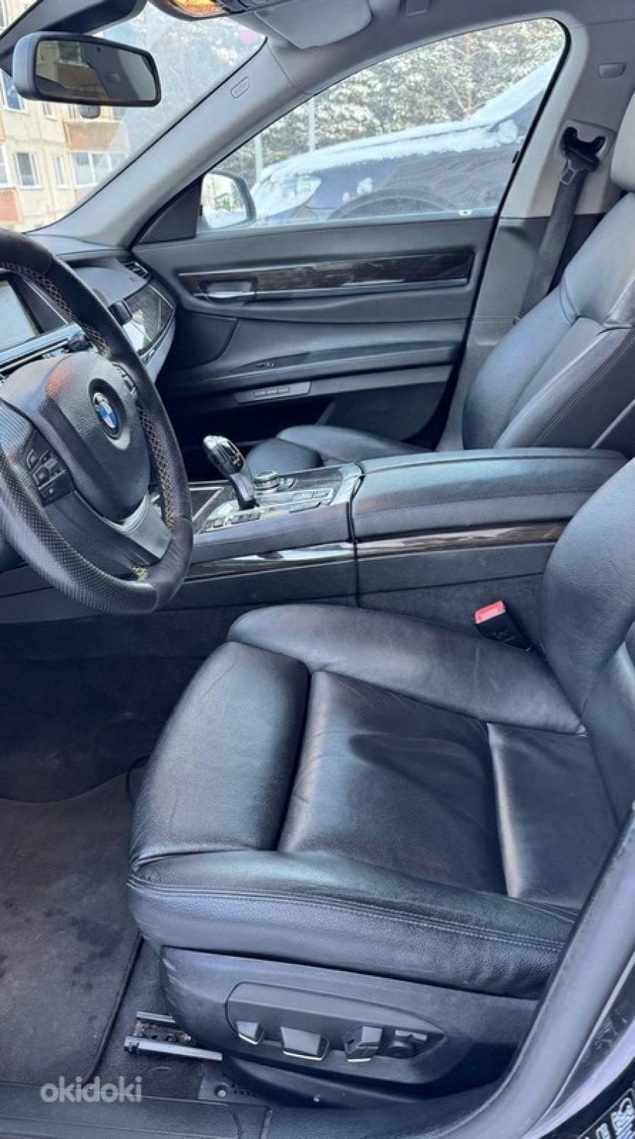 Black BMW 740 2013 in Tallinn, with an engine capacity of 3.00 L and mileage of 188 thousand km for 14000 €, photo 25 on AUTOMOTO.COM.LV