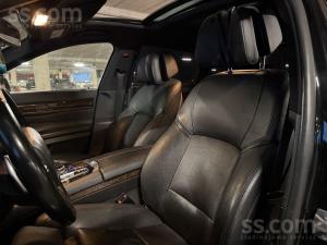 Black BMW 740 2013 in Riga, with an engine capacity of 3.00 L and mileage of 304 thousand km for 12750 €, photo 17 on AUTOMOTO.COM.LV